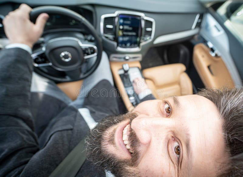 Wide Angle of a Male Driver in Luxury Car Stock Image - Image of ...