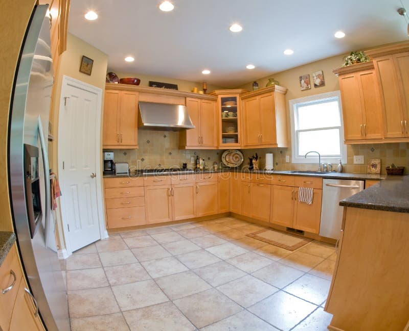 Kitchen Wood Cabinets Black and Stainless Stove Stock Photo - Image of ...