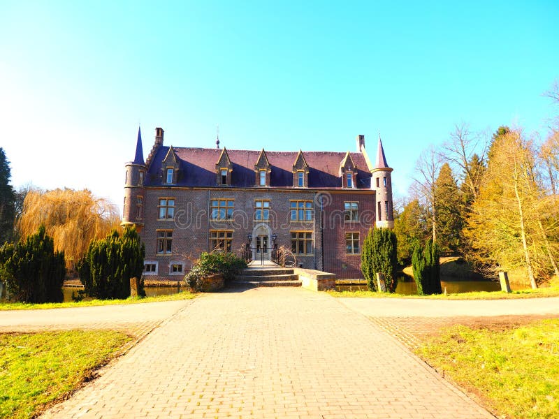Wide Angle Shot of a Building Surrounded by Trees and Grass Stock Image ...