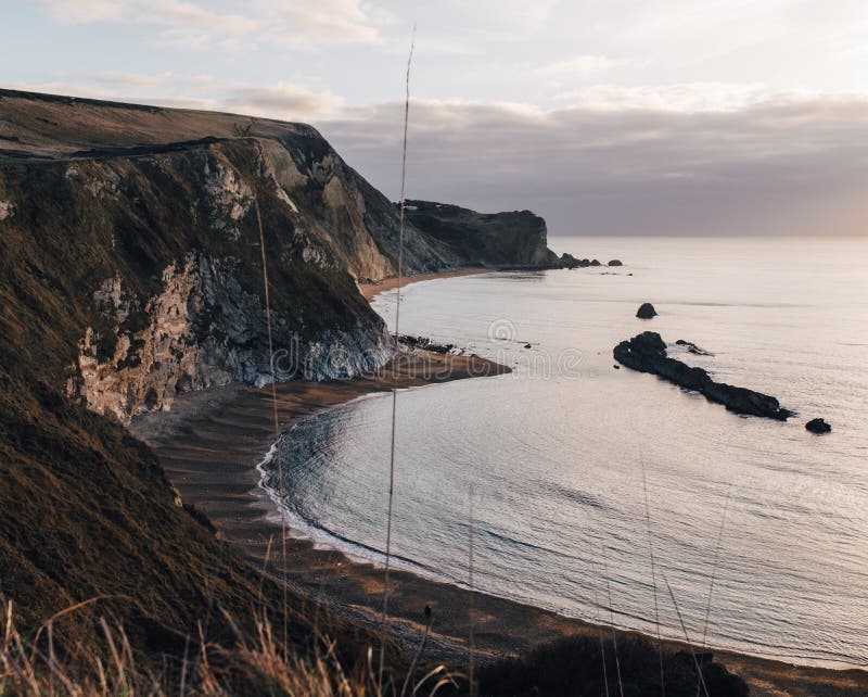 Wide Angle Shot of the Cliffs and Rocks of the Beach Stock Image ...