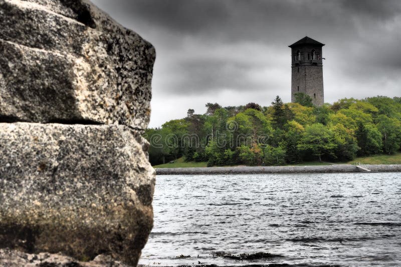 Lighthouse in the Forest between the Trees. Red and White Lighthouse ...
