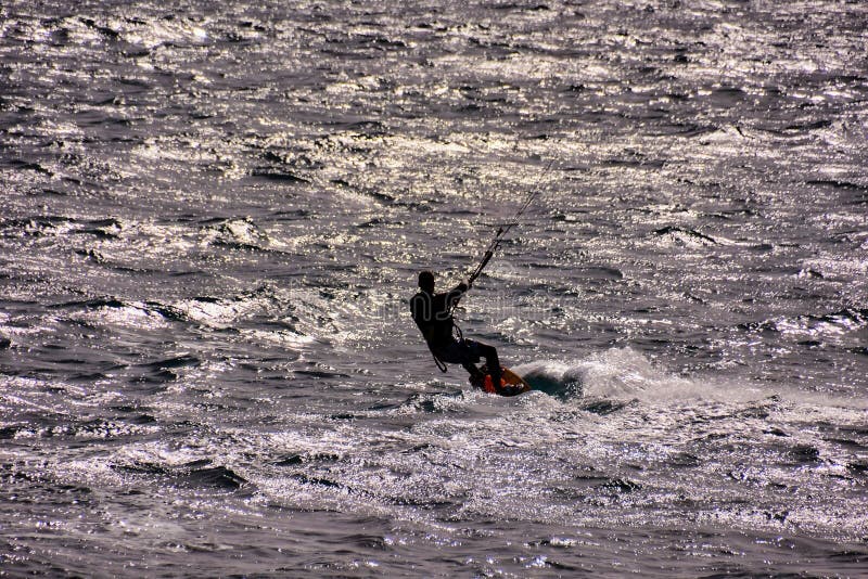 Wide Angle Shot of a Man Surfing in the Water Stock Image - Image of ...