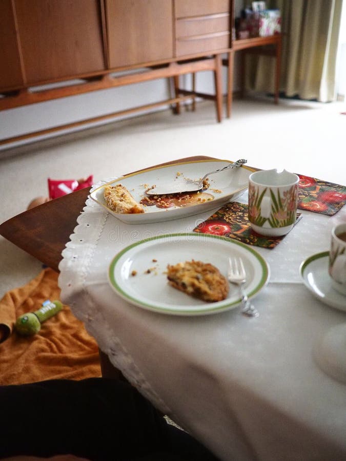 Wide Angle Shot of Several Plates on the Table with Food Remains Inside ...