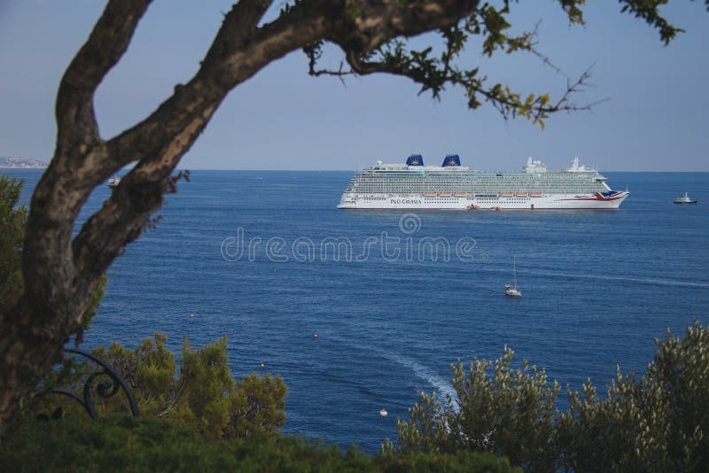 Wide Angle Shot of a Ship Sailing through the Ocean Under a Tree ...