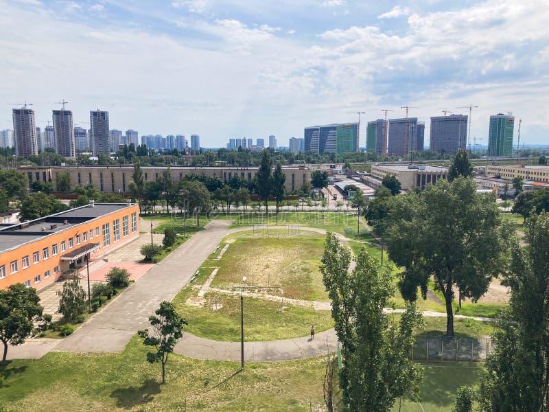 Wide-angle Urban Landscape Image with Paved Open Space, Structure Under ...