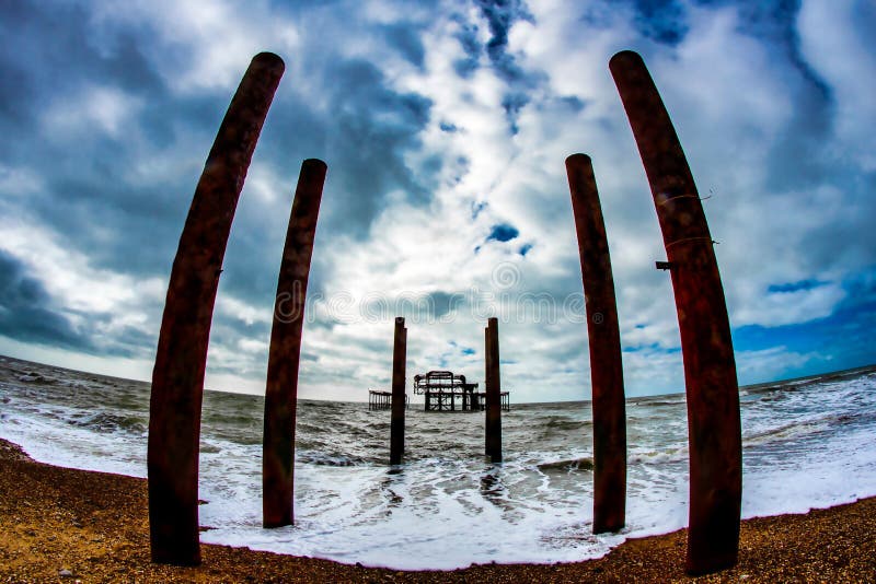 Wide-angle View of Columns at the Beach before the Seascape Under the ...