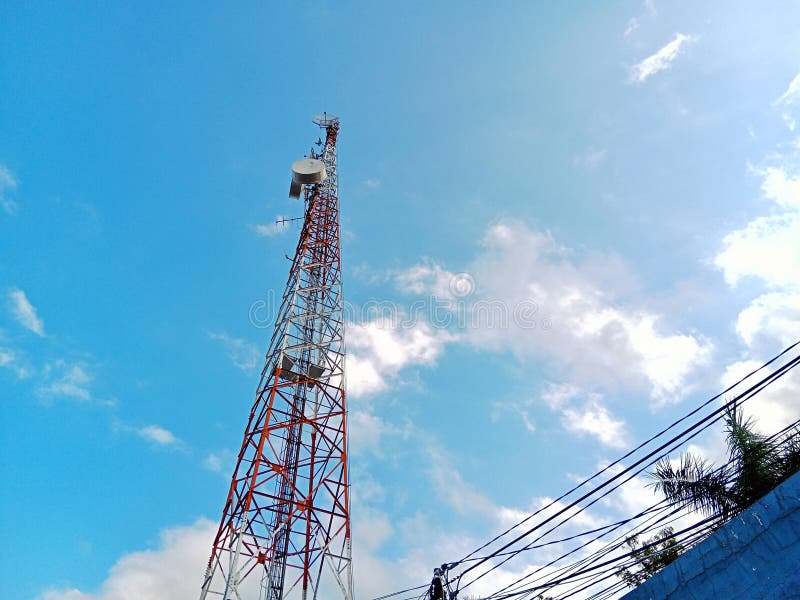 Wide Angle View of Telecommunication Tower with Cloudy Sky Background ...