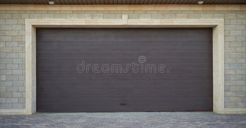 Wide Automatic Garage Door and Luxury Garage with Stone Walls Stock ...