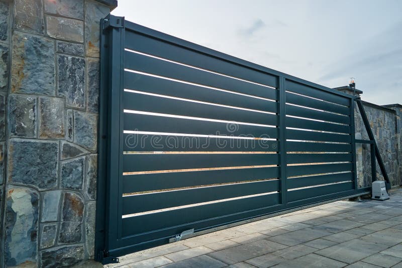 Wide Automatic Sliding Gate with Remote Control Installed in High Stone ...