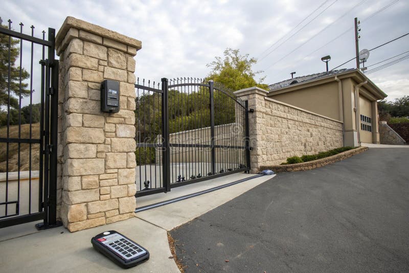 Wide Automatic Sliding Gate with Remote Control in Stone Fence Stock ...