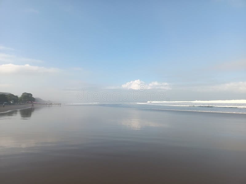A Wide Expanse of Beach Like a Mirror Stock Image - Image of mirror ...
