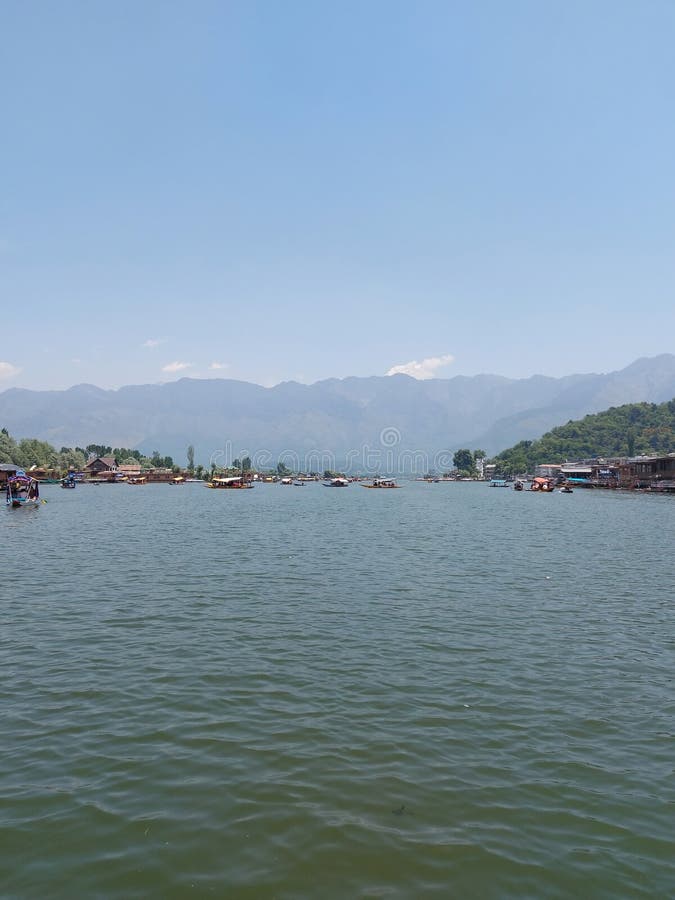 Mountainous River Landscape with Bridge and Figures Stock Photo - Image ...