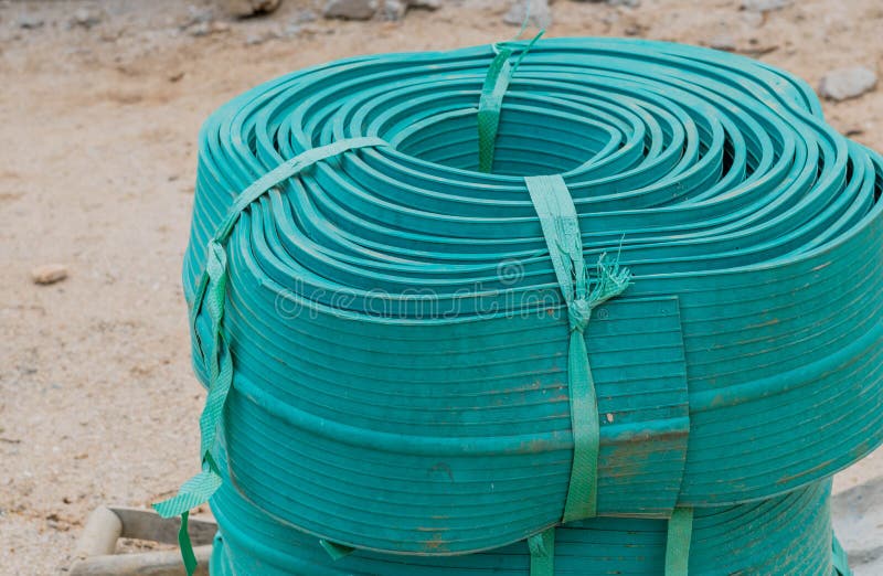 Wide Grooved Rubber Section Rolled Up Stock Photo - Image of ground ...