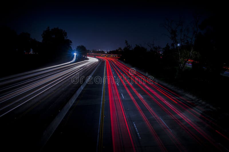 Wide Highway with Abstract Bright Traffic Light Trails at Night ...