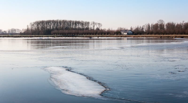Wide Ice Surface on a Small Lake Stock Image - Image of countryhouse ...