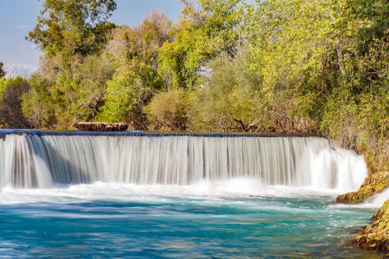 Wide and Low Waterfall on River, Blurred Water Movement Stock Image ...