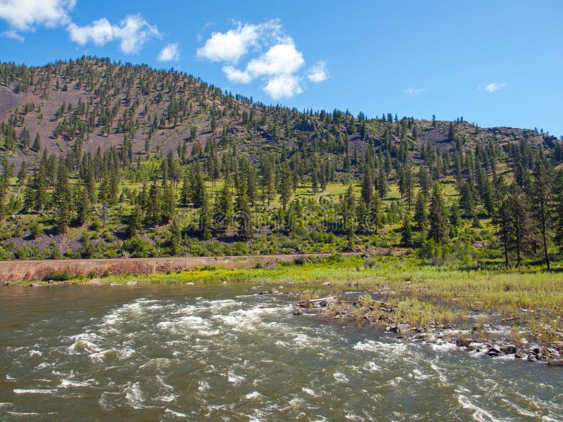 Wide Mountain River Cuts a Valley - Clark Fork River Stock Image ...