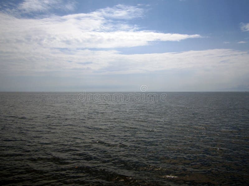Wide ocean and clear sky stock photo. Image of white - 134962544