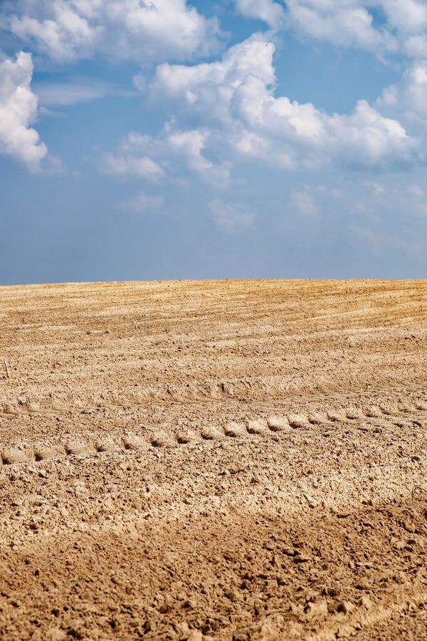 Wide Open Field with Rich, Brown, Ploughed Earth Stock Photo - Image of ...