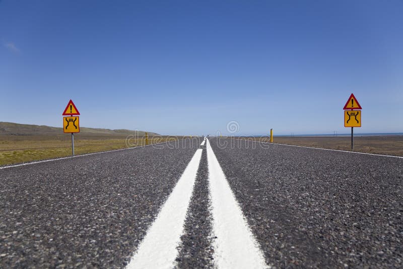 Wide Open Road with Warning Signs Stock Image - Image of warning ...