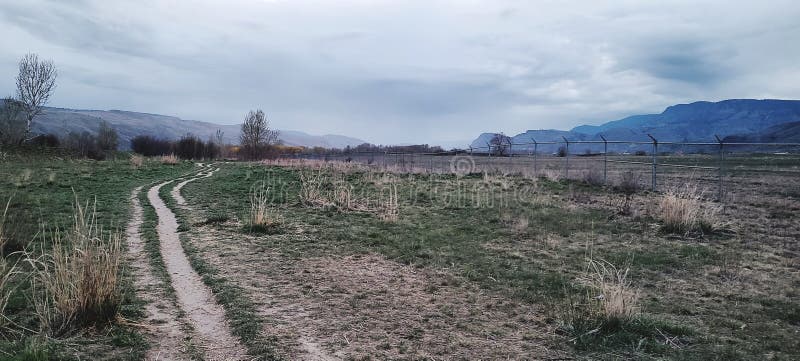 Wide open spaces stock photo. Image of plain, wall, tree - 179688862