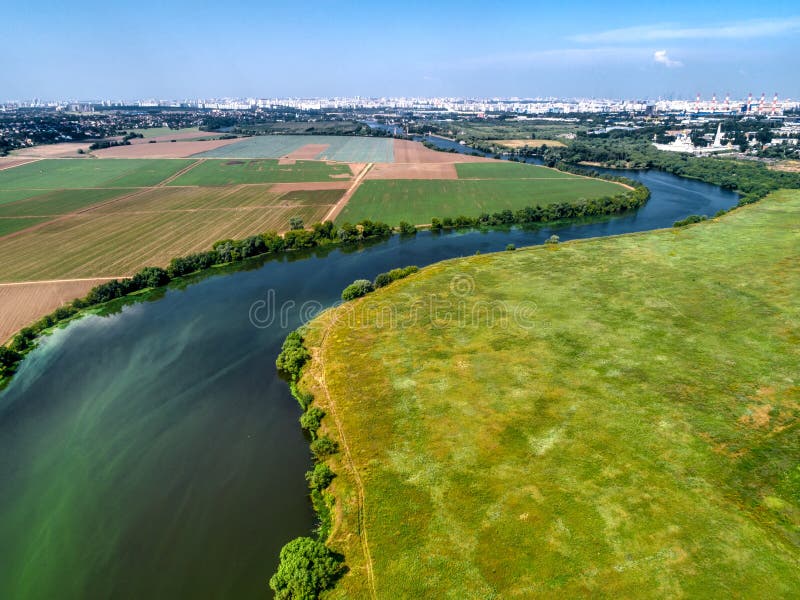 Wide River Flowing between Fields Stock Photo - Image of tree ...