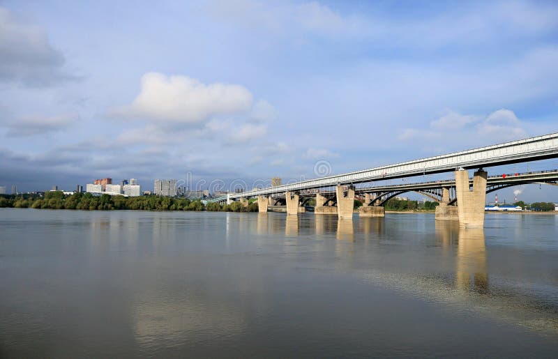 Embankment of a Wide River and a Bridge Across the River. Stock Photo ...