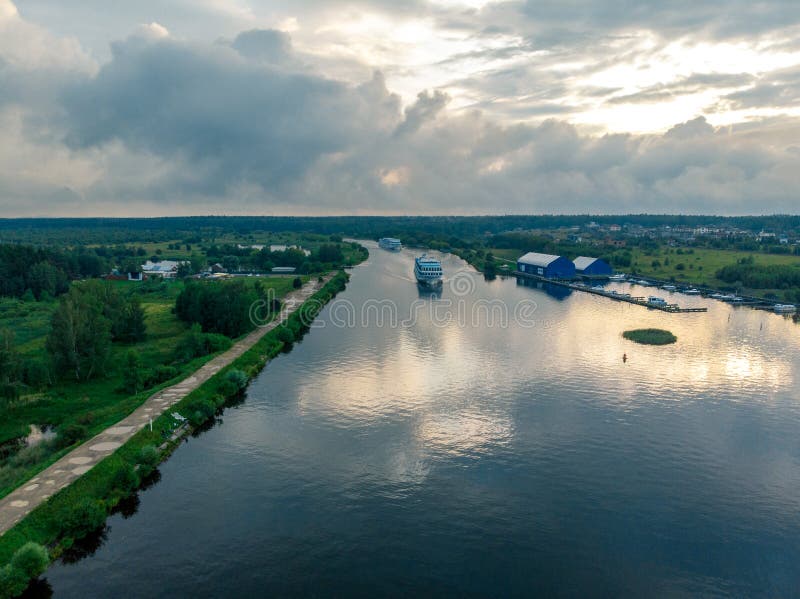 Wide River Reflects Clouds. the Ship Moves Towards Stock Photo - Image ...