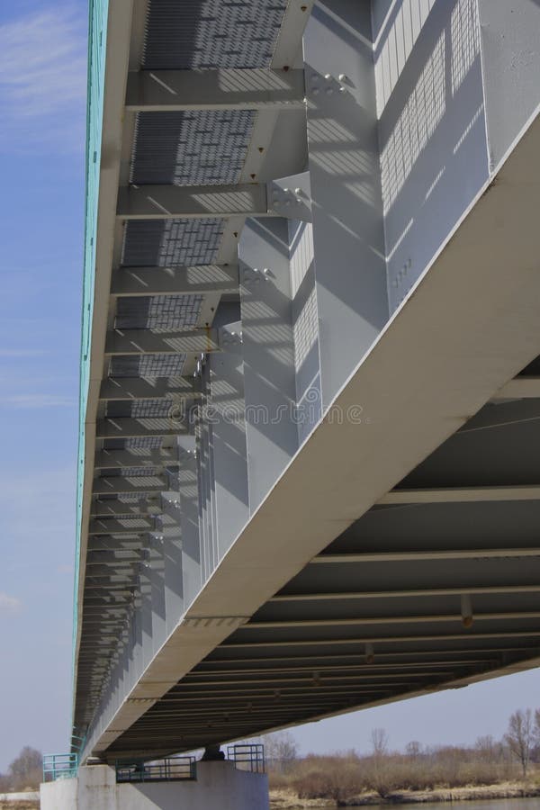 A Long Railway Bridge Seen from the Side of the River Stock Image ...