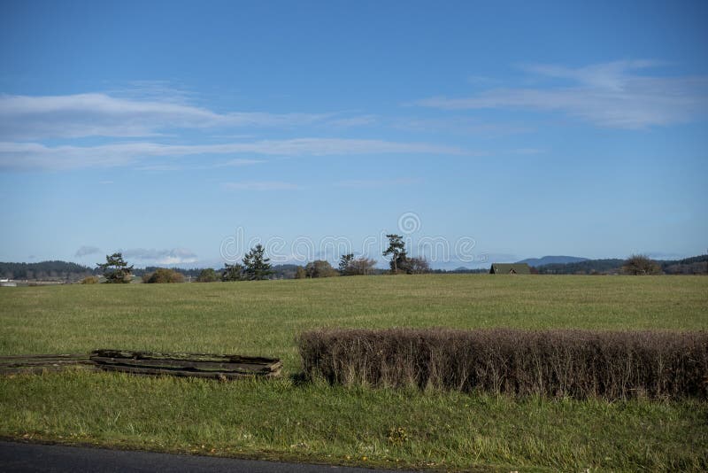 Wide, Scenic View of a Large Plot of Farm Land in the Pacific Northwest ...