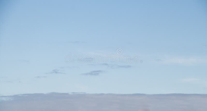 Wide Shot of a Blue Sky with Fading Clouds on a Cool Day Stock Image ...