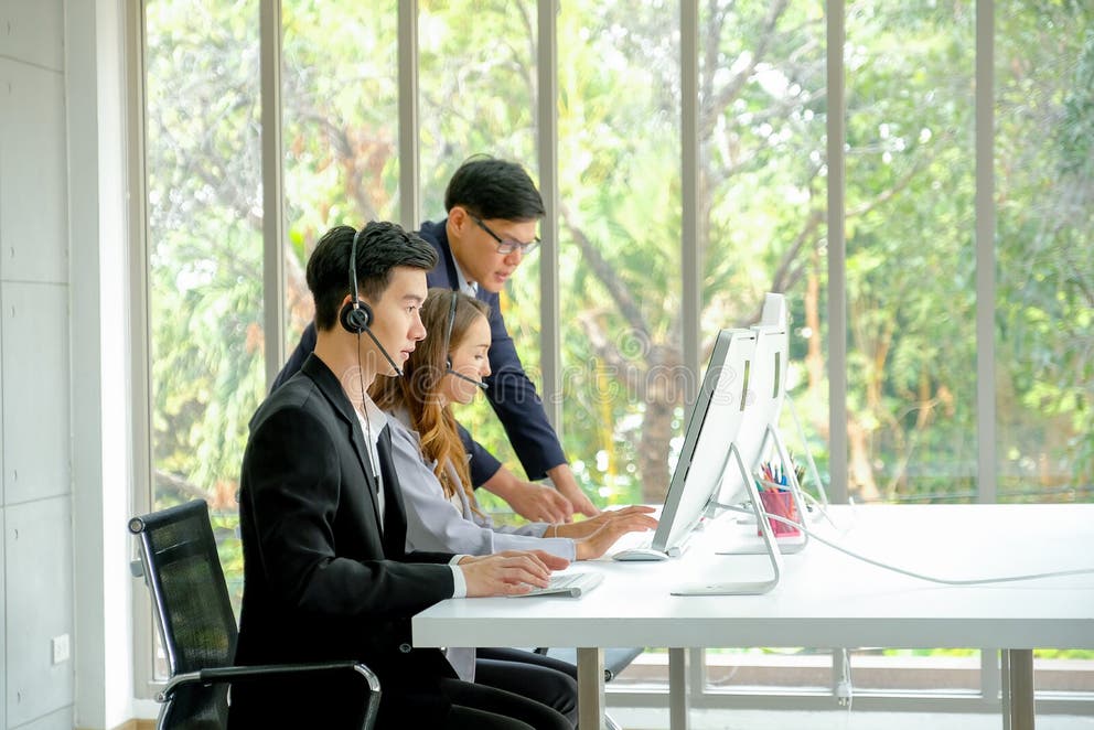 Wide Shot of Chief Help and Support His Operator Team for Good Working ...