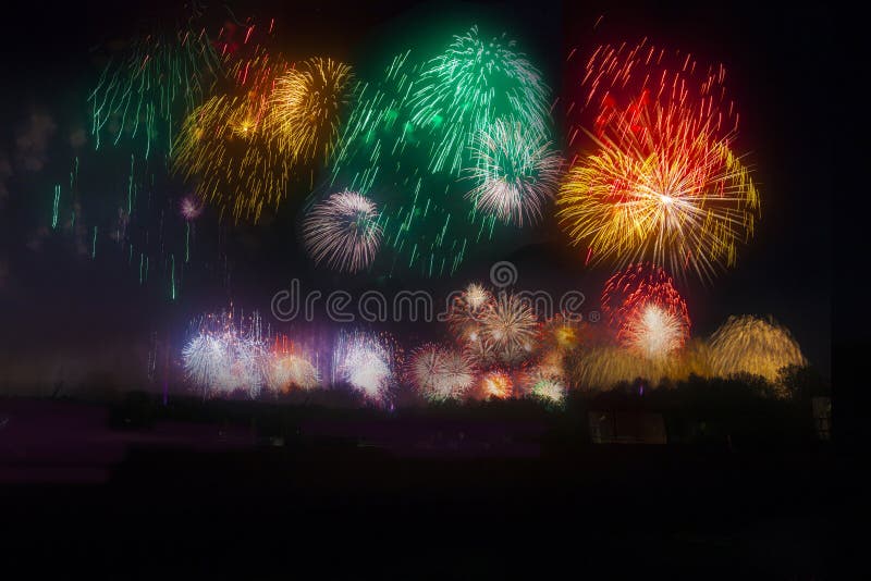 Wide Shot of Colorful Fireworks Exploding in the Night Sky Stock Photo ...