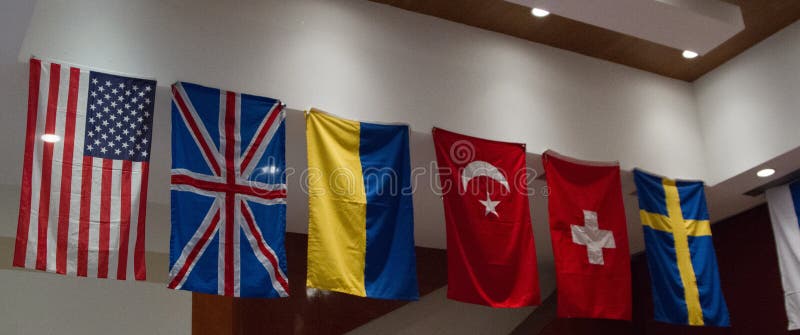 Wide Shot of Different Country Flags Hanging from the Ceiling Stock ...