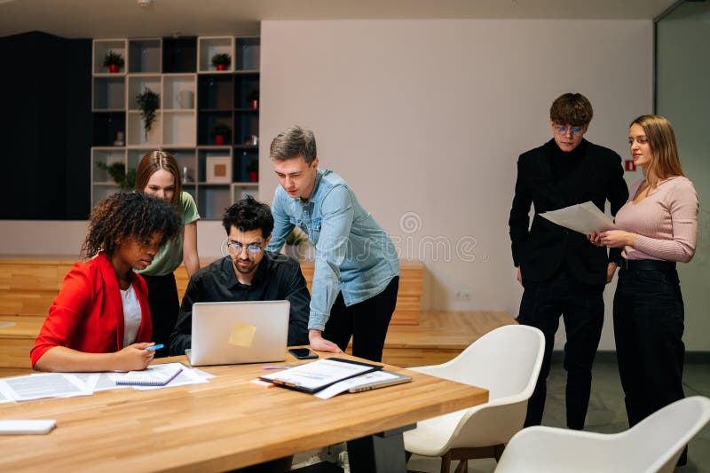 Wide Shot of Diverse Employees or Students Team Watching Webinar on ...