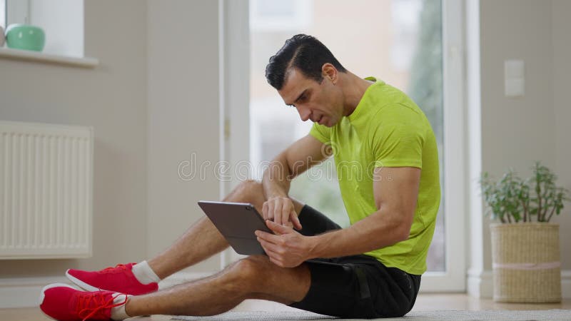Wide Shot Side View of Concentrated Handsome Middle Eastern Man Sitting ...