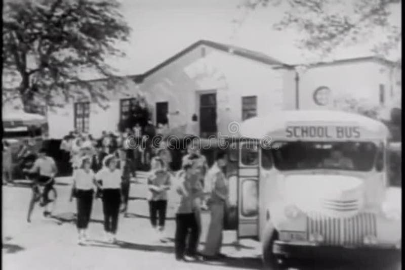 Students Boarding School Bus at Bus Stop before Going To Lessons ...