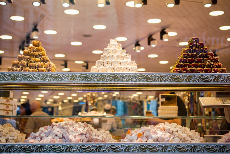 Wide Shot of Three Kinds of Sweet Treats Piled into Pyramids Inside a ...