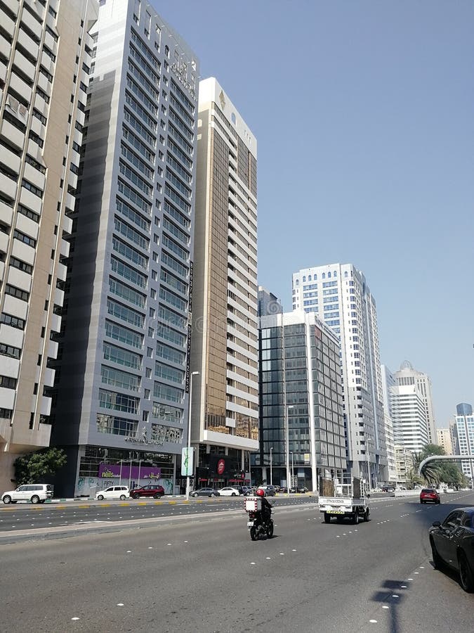 Wide street in abu dhabi stock photo. Image of building - 272744342