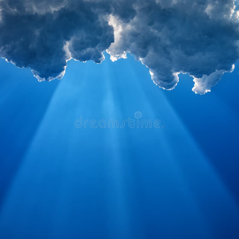 A Wide Sunray Breaks through Dark Cumulus Clouds Stock Photo - Image of ...