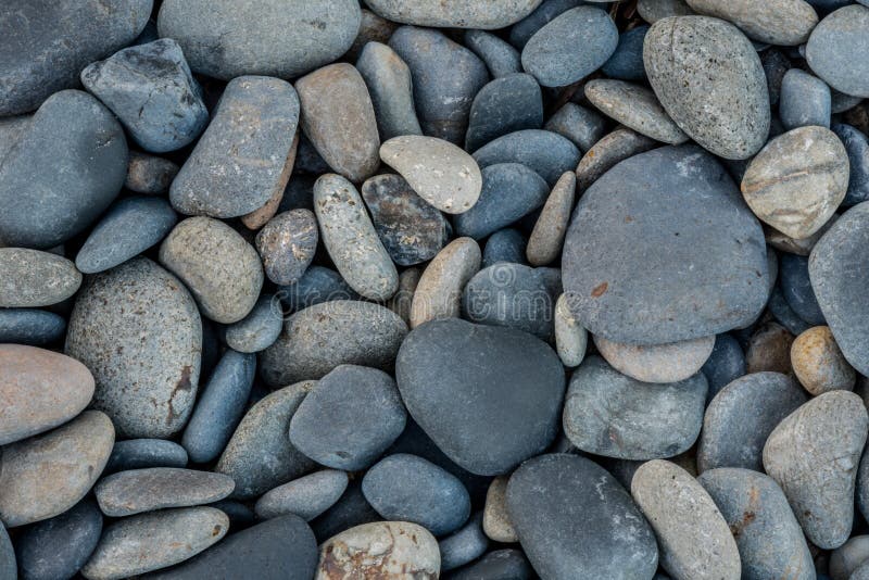 Smooth beach stones stock image. Image of round, stone - 185567