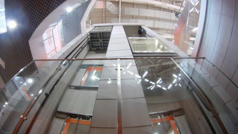 Wide View of Two Elevators Going Up and Down, Stock Video - Video of ...