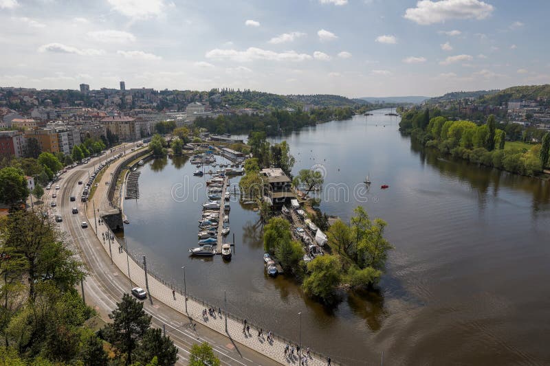WIde View of Vltava River in Prague, Small Boat and Road Traffic. Stock ...