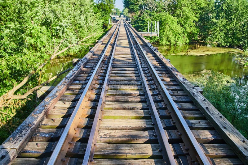 Wide View Walking on Railroad Train Tracks Crossing Over Water Stock ...