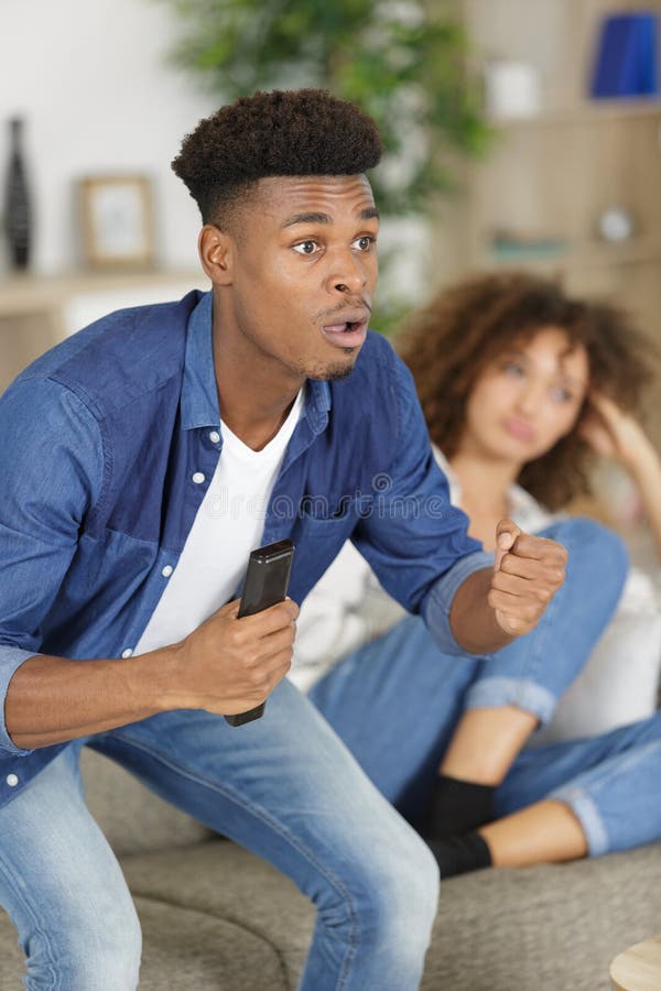 The Wife Unhappy that Husband is Watching Football Stock Image - Image ...