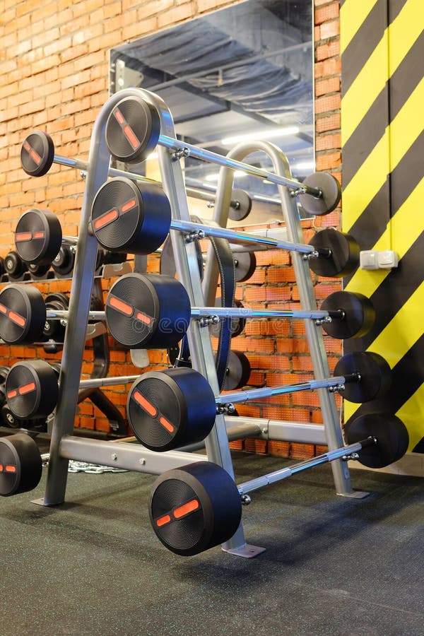 Wights in a fitness hall stock photo. Image of disk, physical - 54242216