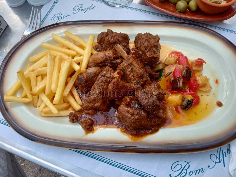 Wild Boar Stew with Fries and Ratatouille Stock Image - Image of ...
