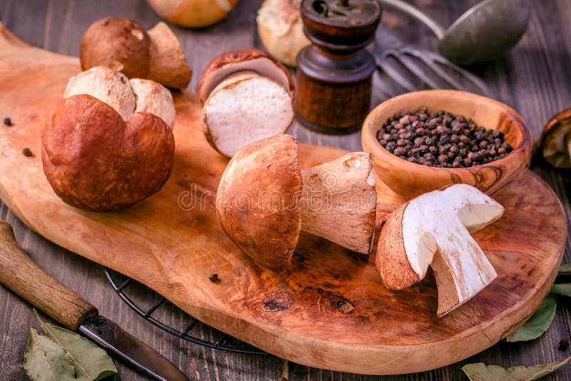 Wild Edible Cepes Mushrooms on Cutting Board Stock Photo - Image of ...