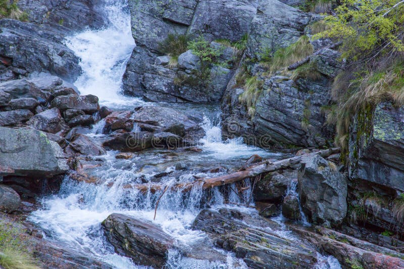 Wild Mountain Stream with Cascades and Debris Stock Photo - Image of ...