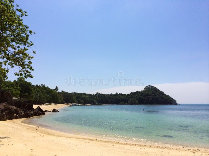 Wild Sandy Beach with Rocks Stock Photo - Image of coast, sand: 136975430